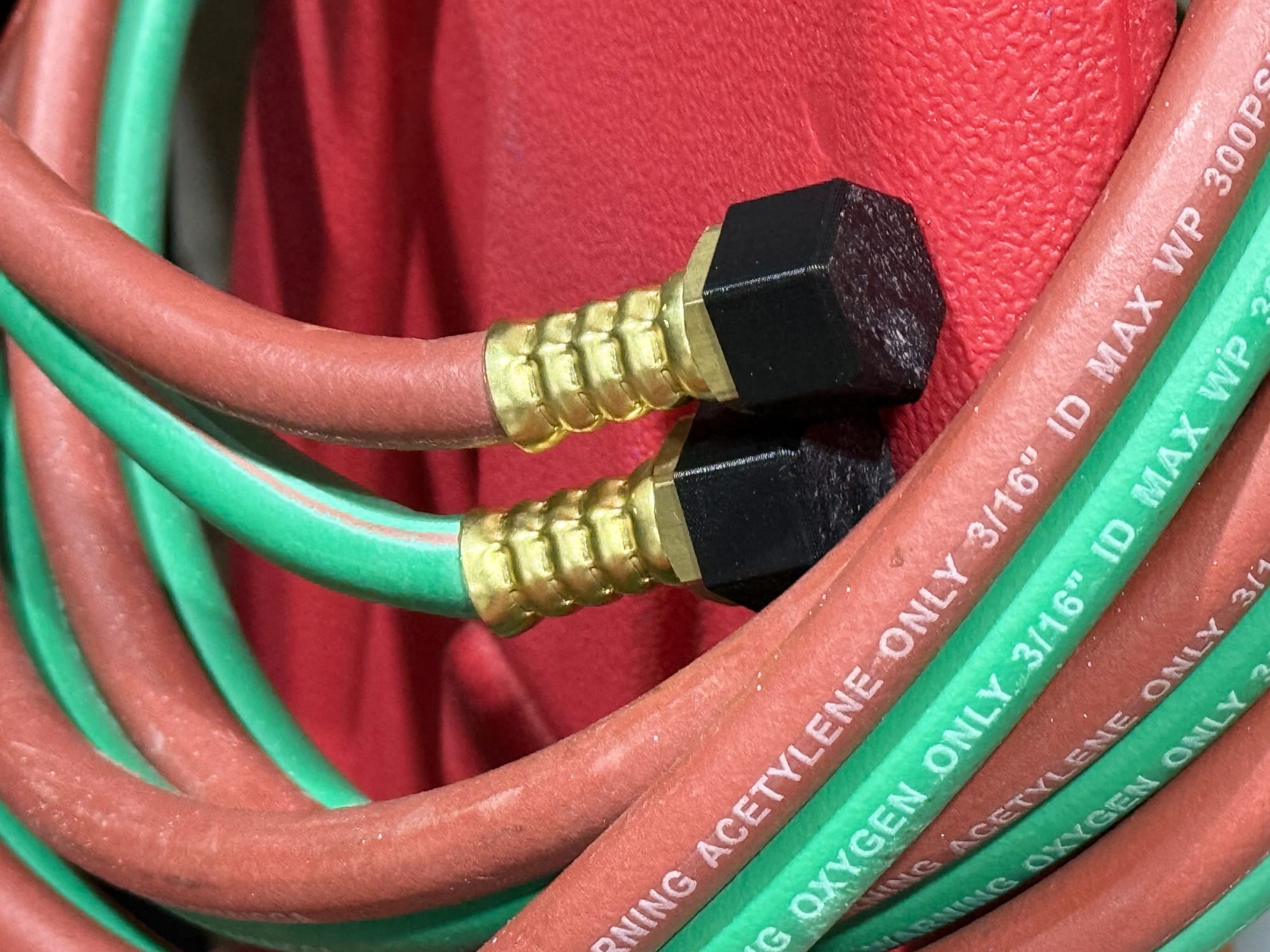 Dust Caps for Oxygen/Acetylene Hoses • Chris Dzombak